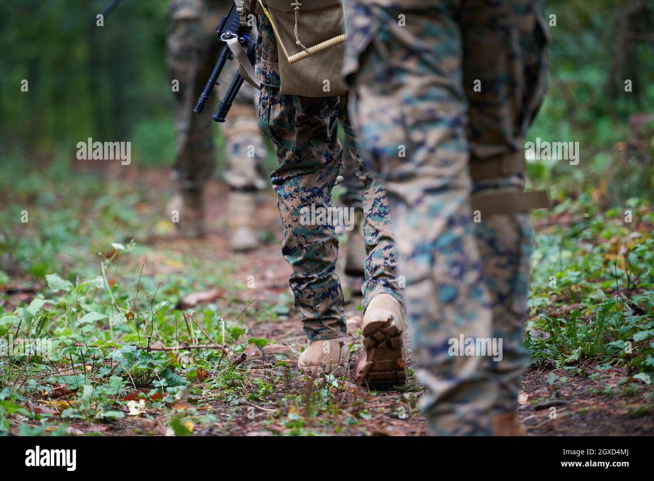 Modern warfare Soldiers Squad Running as Team in Battle Formation Stock ...