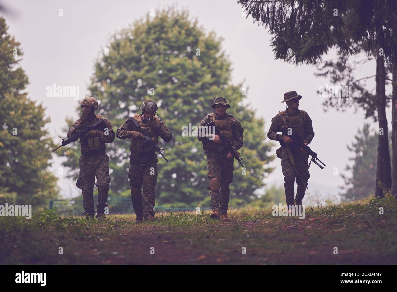 soldiers squad relaxed walking after battle Stock Photo - Alamy