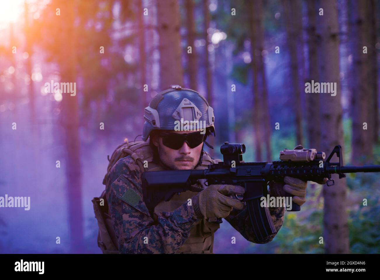 soldiers squad in action on night mission using laser sight beam lights ...