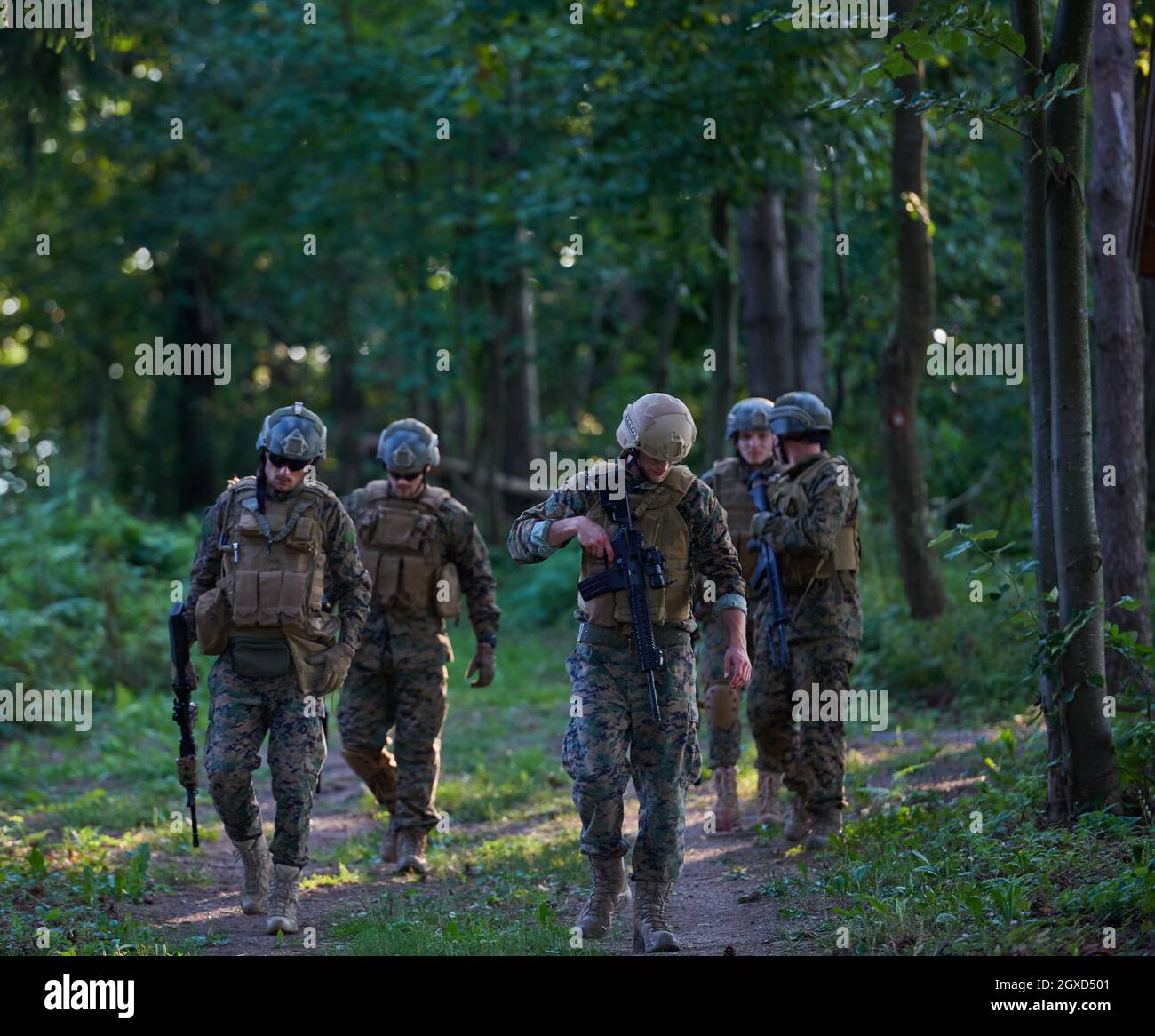 Modern warfare Soldiers Squad Running as Team in Battle Formation Stock ...