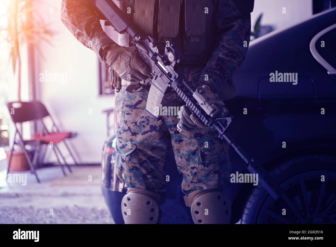 soldier protecting armored luxury vehicle a security guard in military ...
