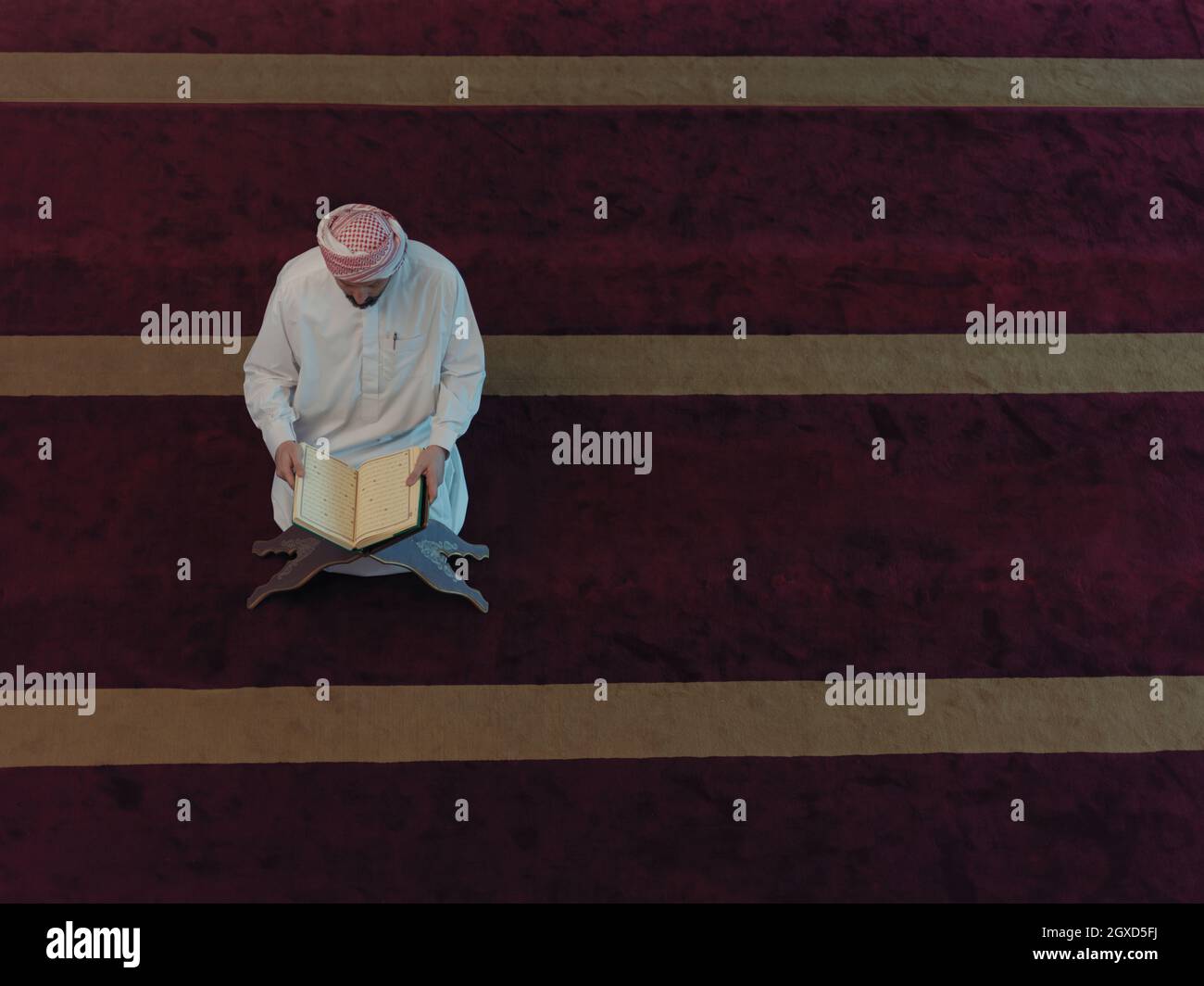 muslim man praying Allah alone inside the mosque and reading islamic ...