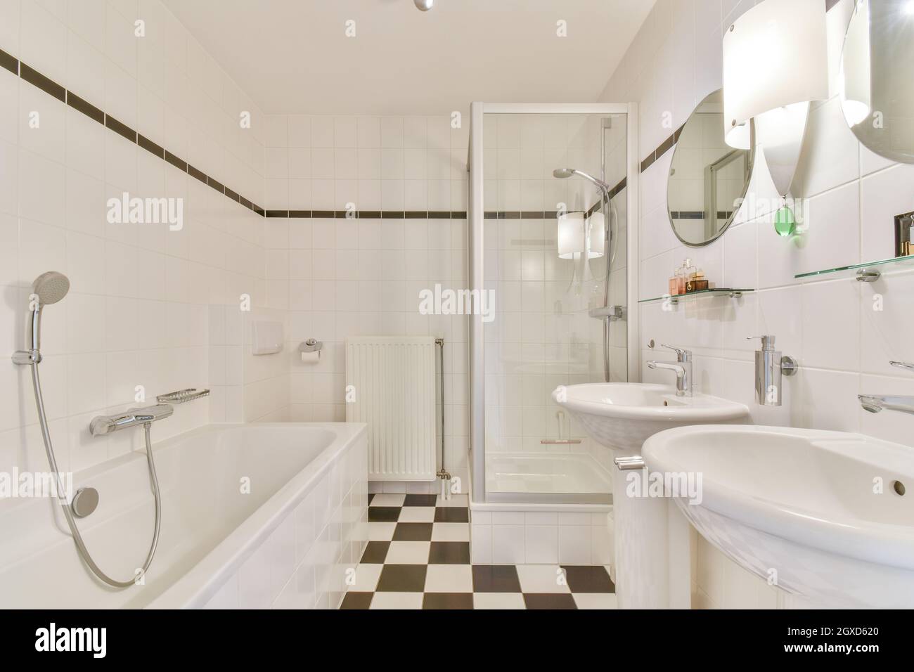 Creative design of bathroom with lamp between washstands against ...