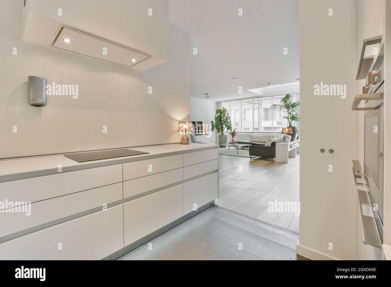 Creative design of kitchen with extractor chimney next to the dining ...