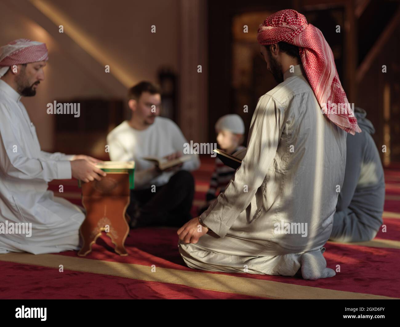 muslim people in mosque reading quran together concept of islamic ...