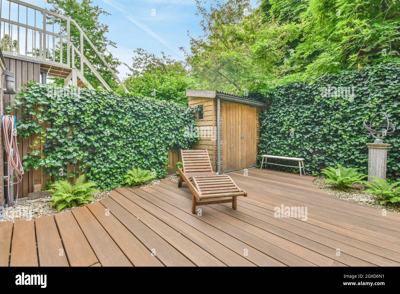 Side view of concentrated muscular male athlete practicing suspension ...