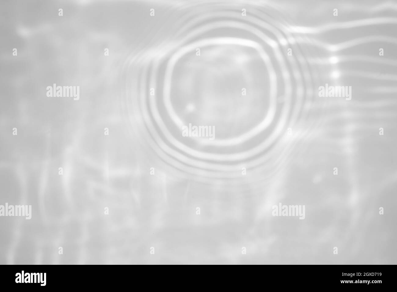 blurred shadow and light caustic effect on a white wall Stock Photo - Alamy