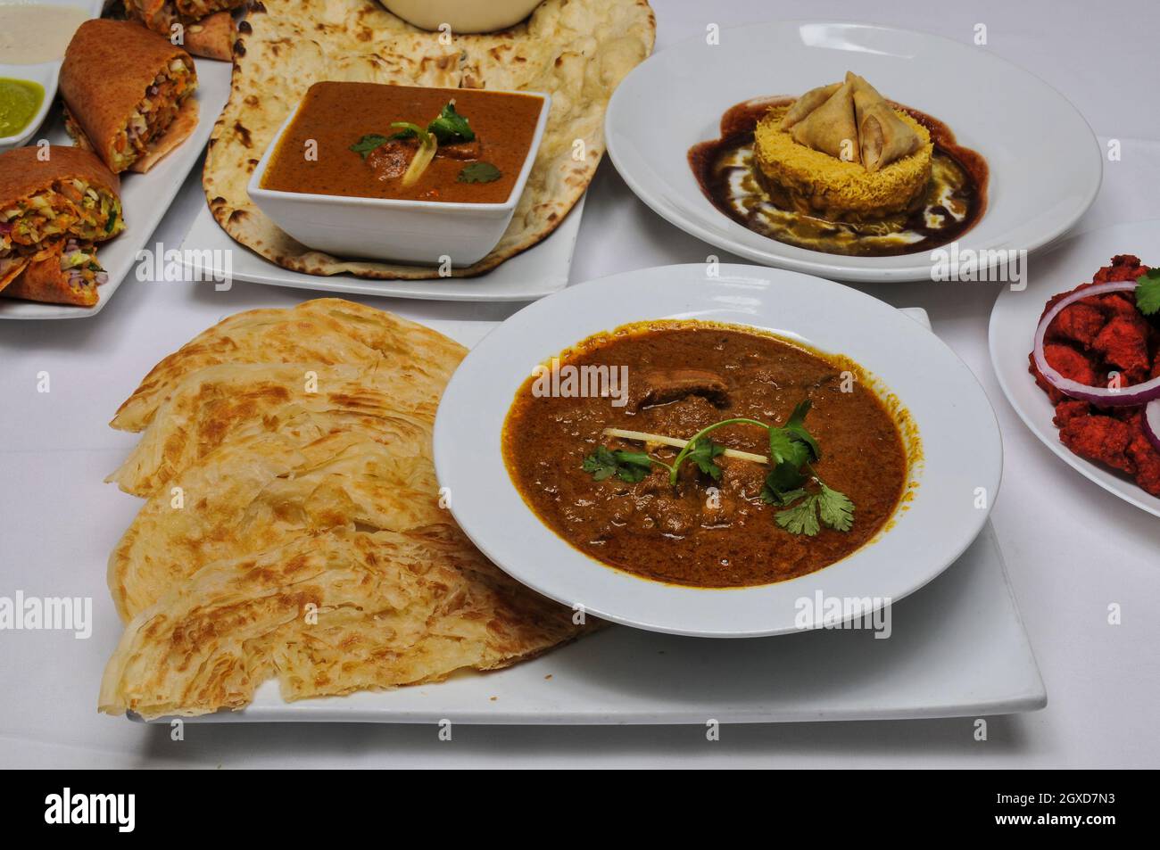Delicious and authentic cuisine known as Chicken Chettinad Parotta ...