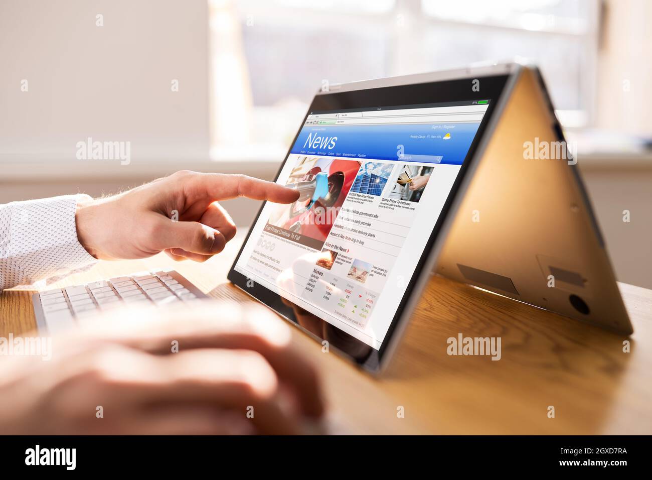 Reading Online News Media. Looking At Newspaper On Screen Stock Photo ...