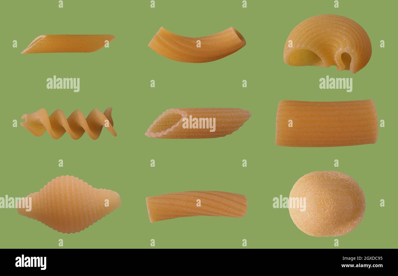 Nine types of Italian pasta over green background Stock Photo - Alamy