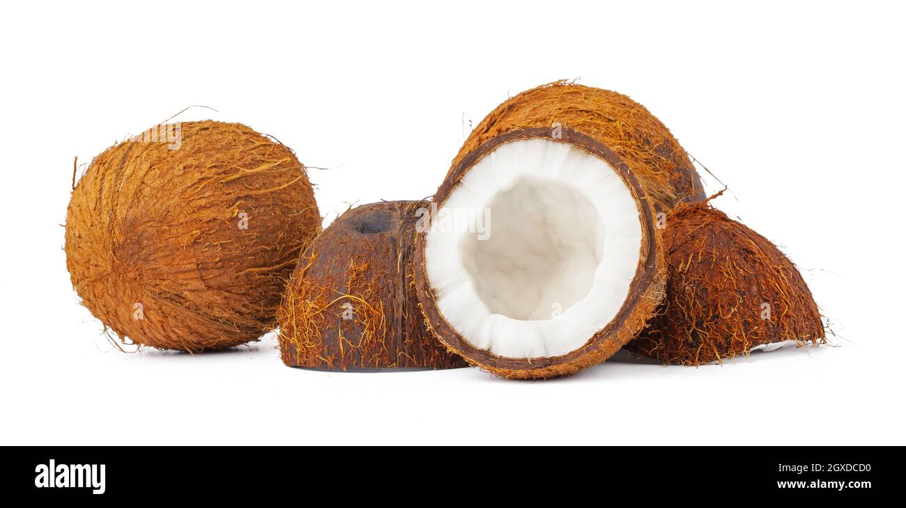 Coconut pieces pile isolated on white background Stock Photo - Alamy