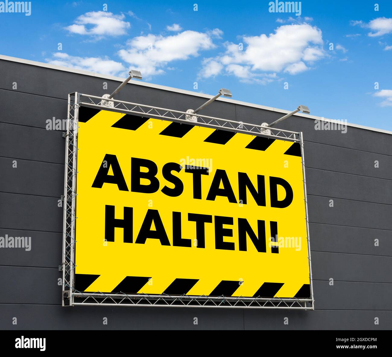 Keep distance in german written on a billboard - Abstand halten Stock ...