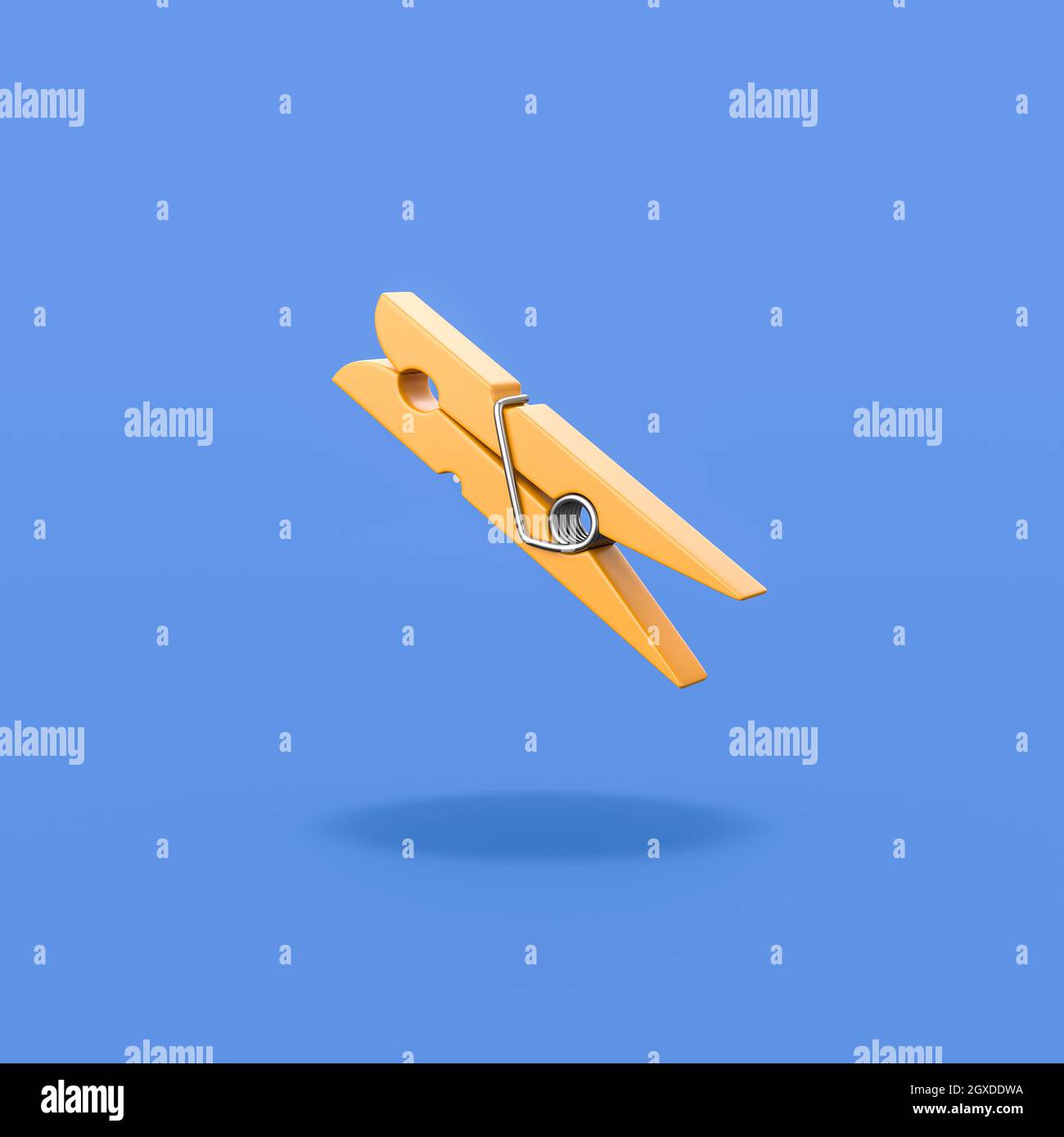 One Orange Plastic Clothespin Isolated on Flat Blue Background with ...