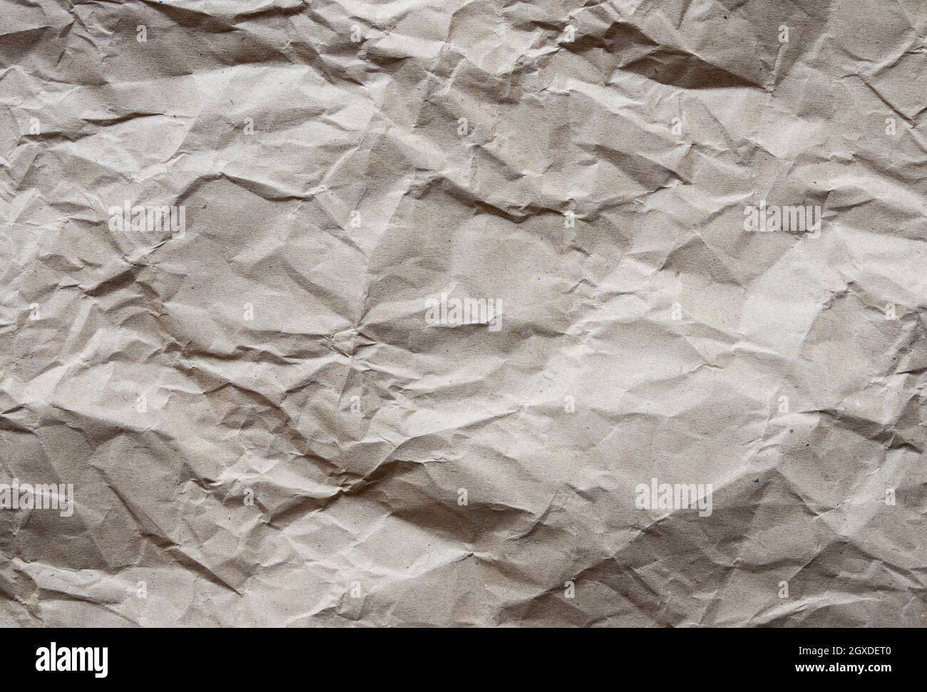 Crumpled brown paper texture background of paperboard sheet Stock Photo ...