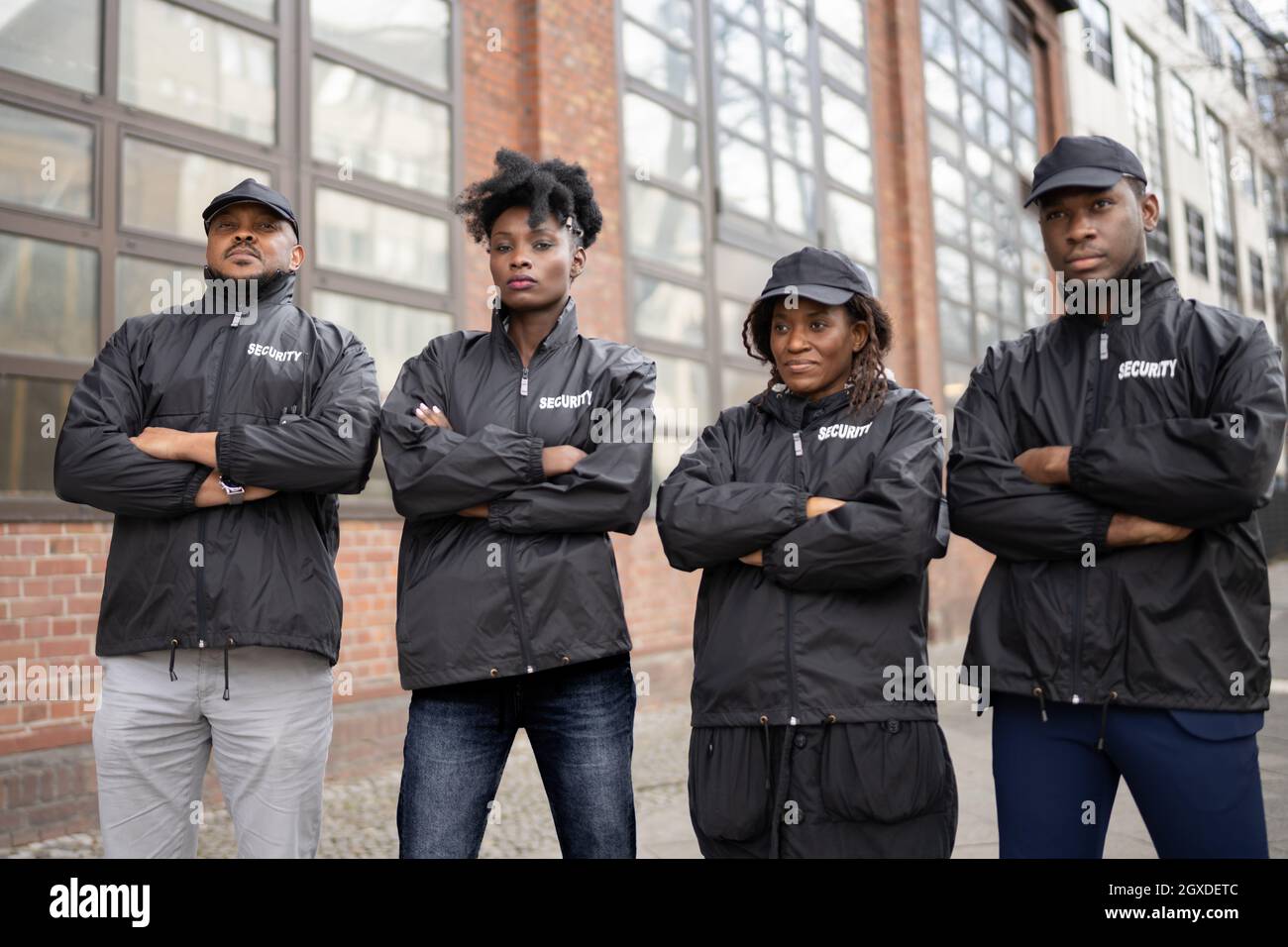 Group Of Security Staff At Event. African Bodyguard Officers Stock ...