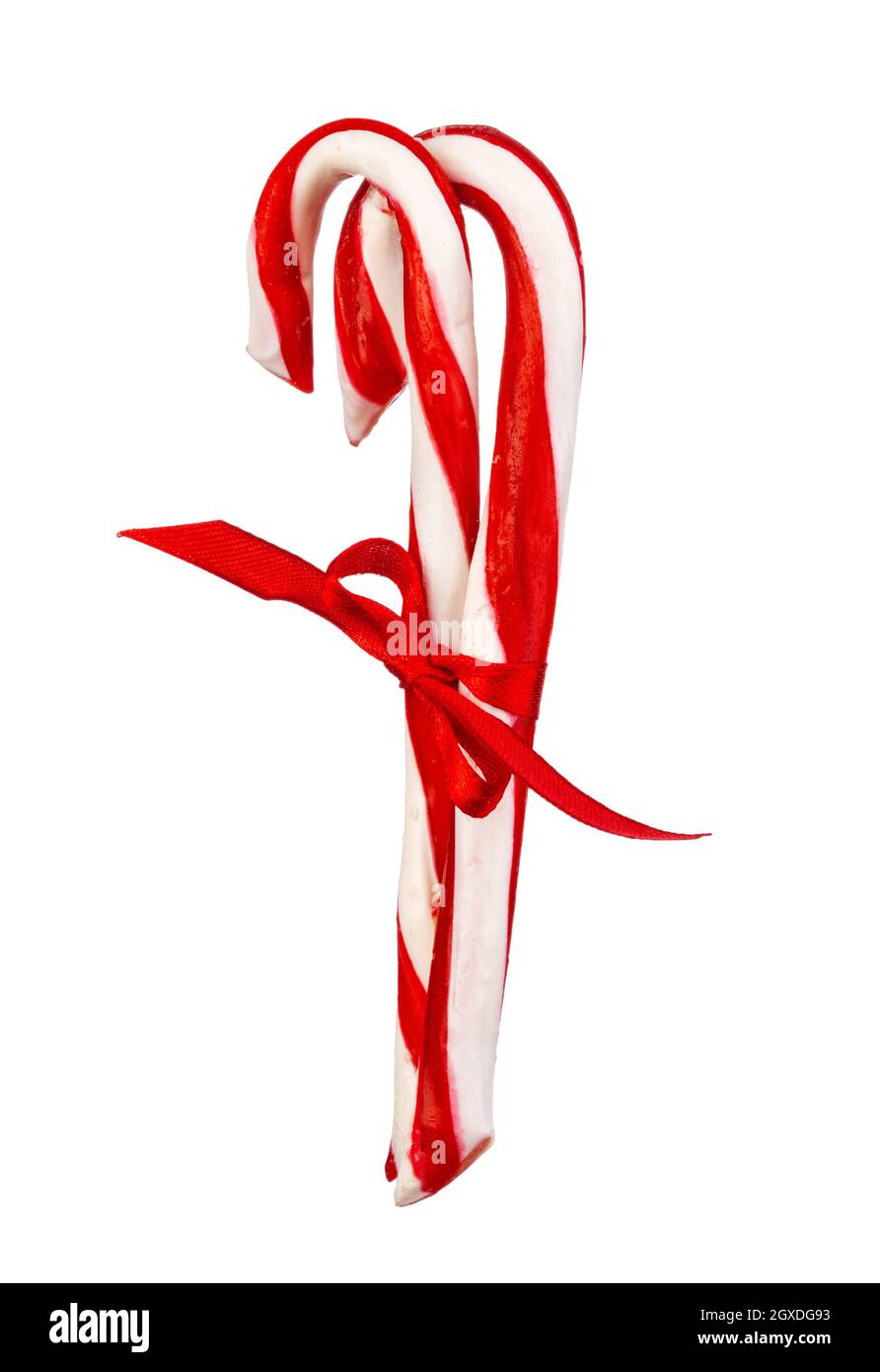 Two candy canes isolated on white background Stock Photo - Alamy