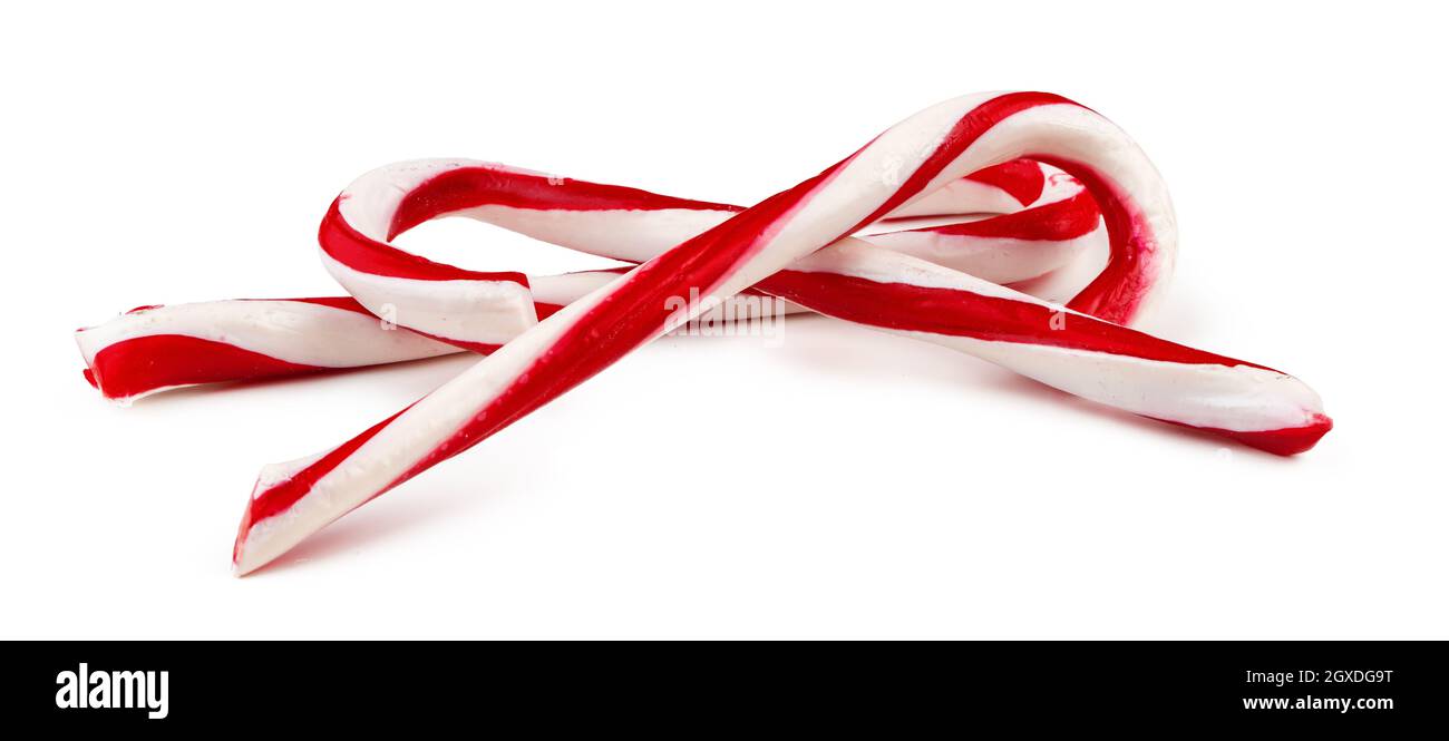 Stack of candy canes isolated on white background Stock Photo - Alamy