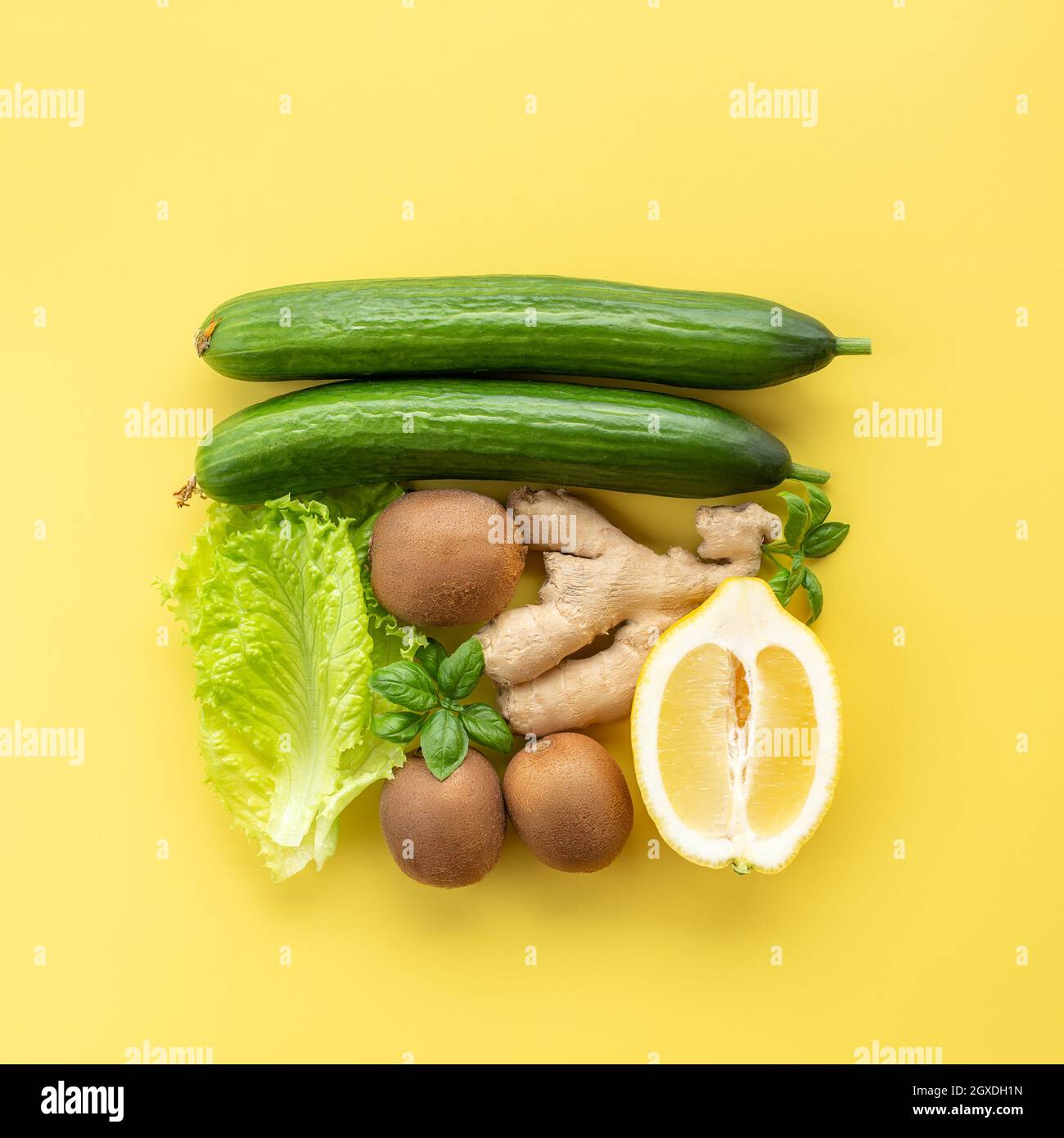 Healthy and organic food flay lay concept on yellow background. A ...