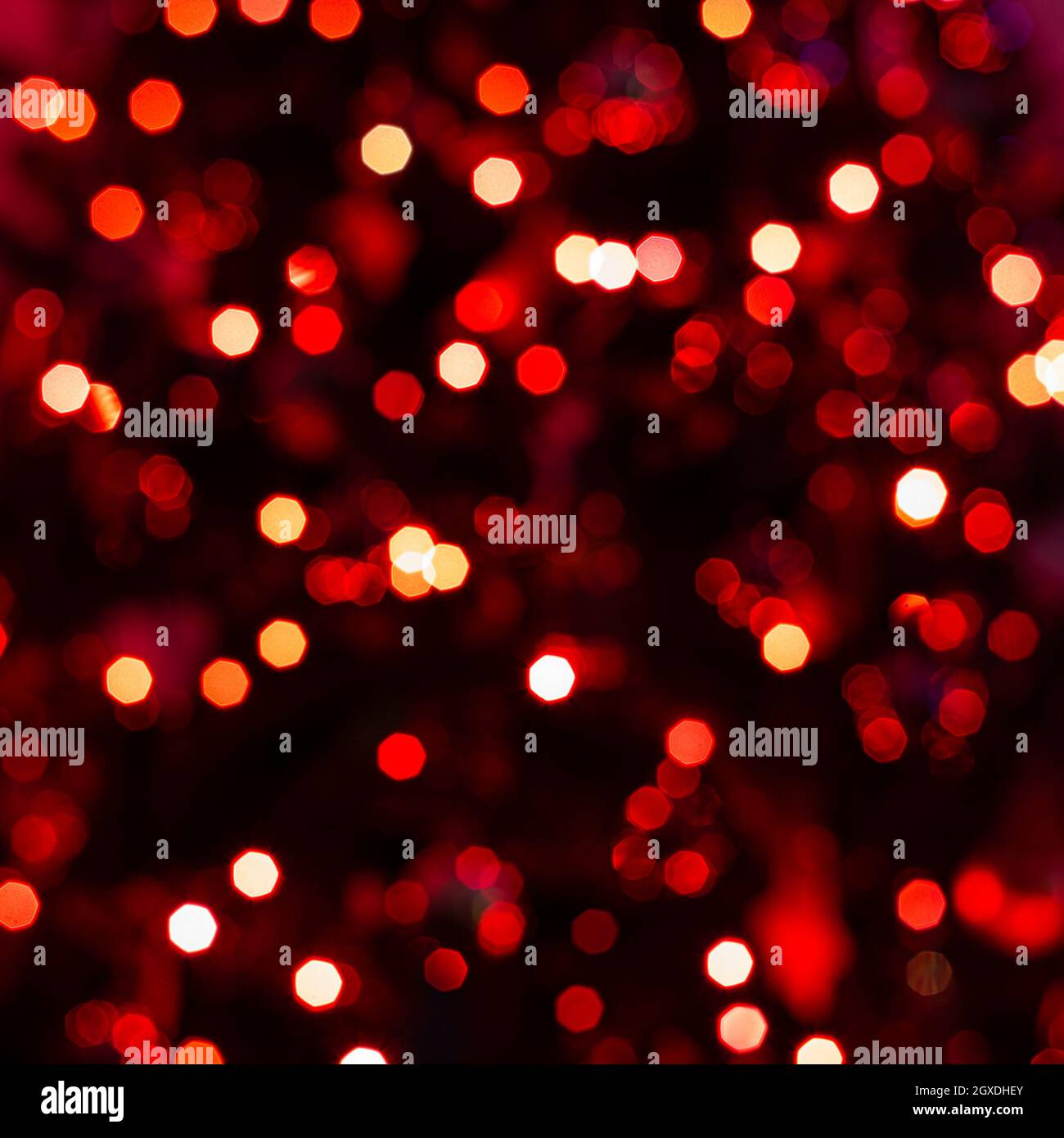 Various blurry red lights on black background Stock Photo - Alamy