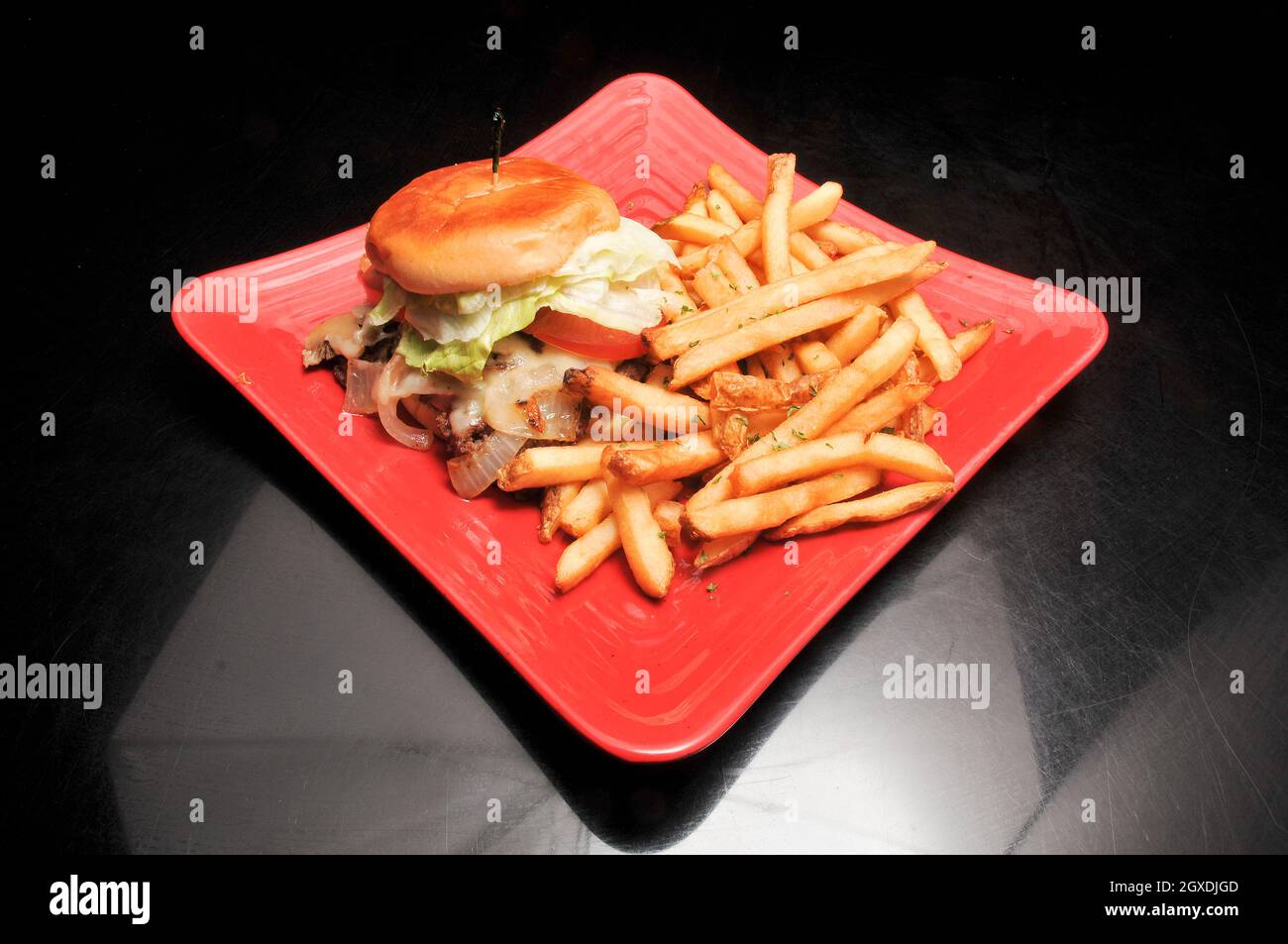 Delicious mushroom and swiss cheese burger with all the fixings on a ...