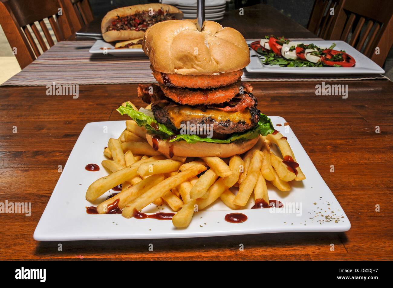 Delicious cheeseburger known as an onion ring cowboy burger Stock Photo ...