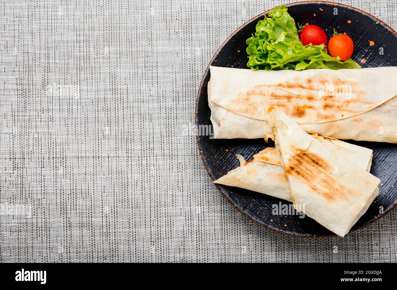 Tasty eastern shawarma with cheese,chicken and mushrooms.Oriental ...
