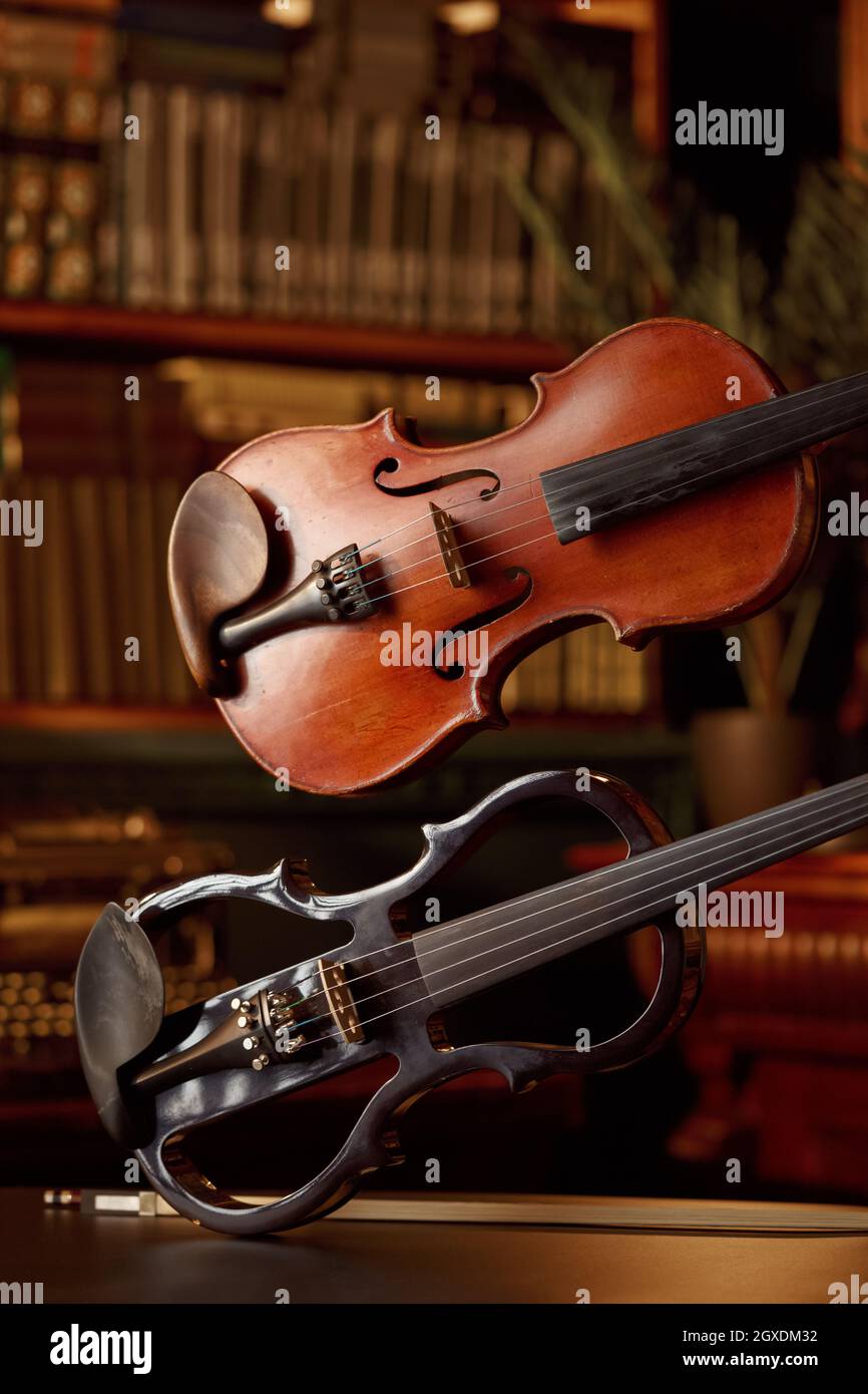Violin in retro style and modern electric viola, nobody. Two classical ...