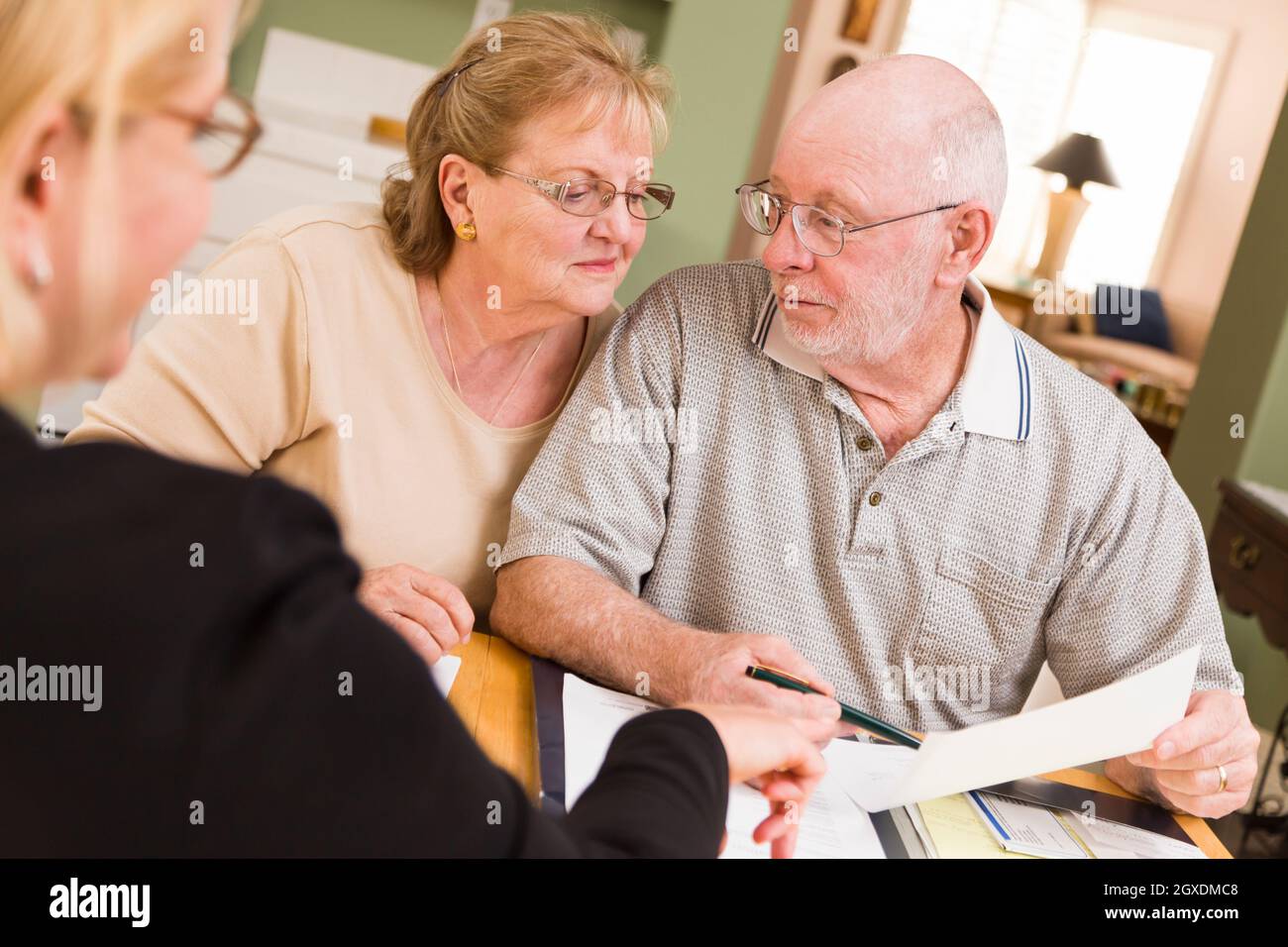 Couple going over paperwork hi-res stock photography and images - Alamy