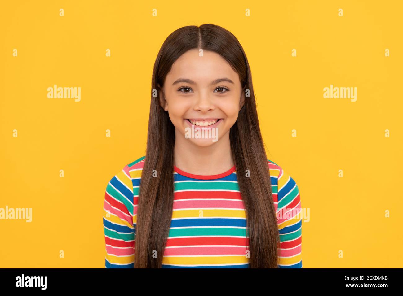 Happy girl child smile yellow background, kid Stock Photo - Alamy