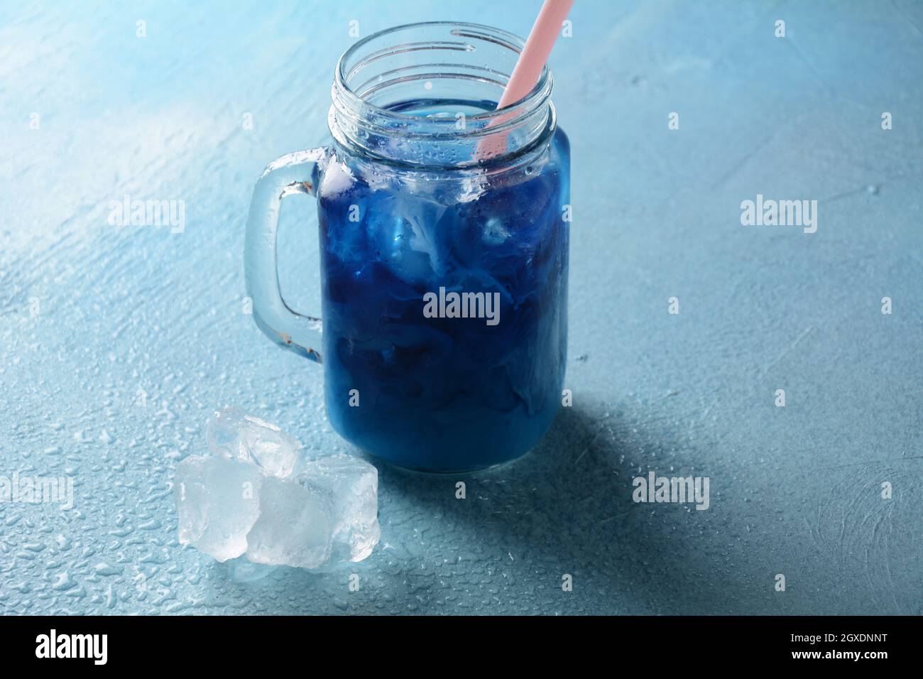 Iced butterfly pea latte. Healthy summer cold beverage, iced organic ...