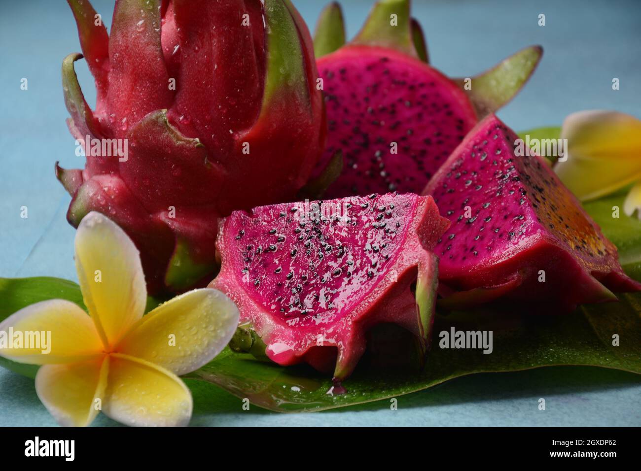 Dragon fruit (Pitaya, Pitahaya) Cut into half, one whole, two sliced ...
