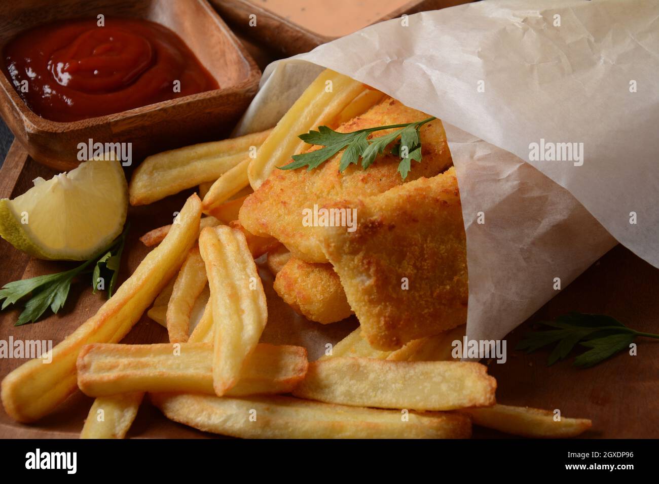Traditional English Food - Fish and Chips. Fried fish filets and crispy ...