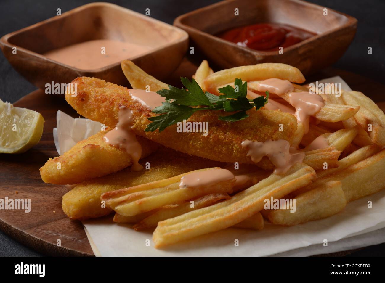 Traditional English Food - Fish and Chips. Fried fish filets and crispy ...