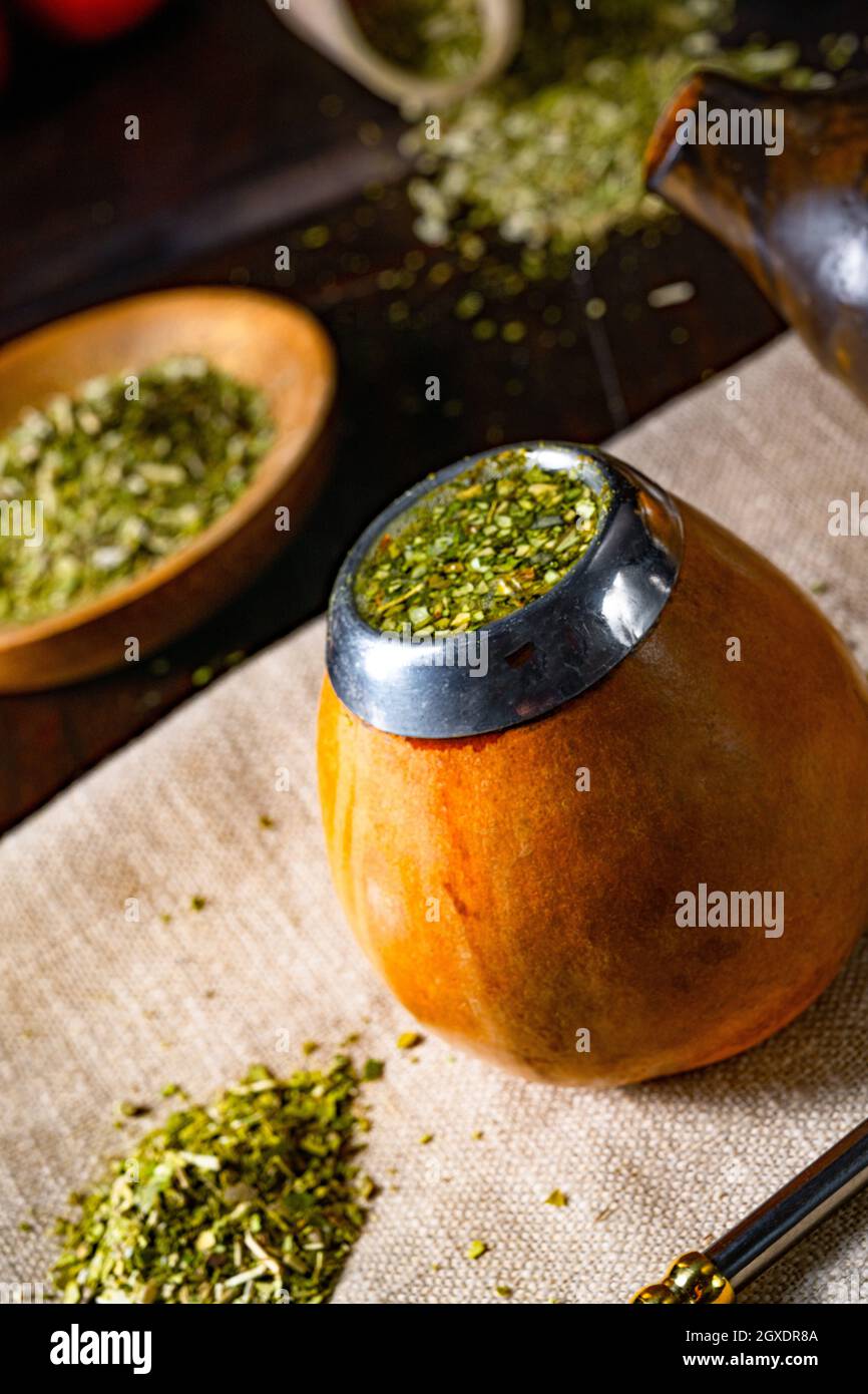 Prepare yerba mate with calabash and bombilla Stock Photo - Alamy
