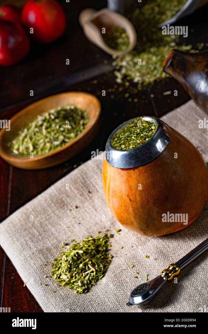 Prepare yerba mate with calabash and bombilla Stock Photo - Alamy