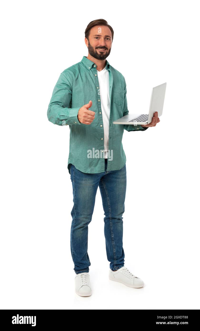Young man with laptop, white background Stock Photo - Alamy