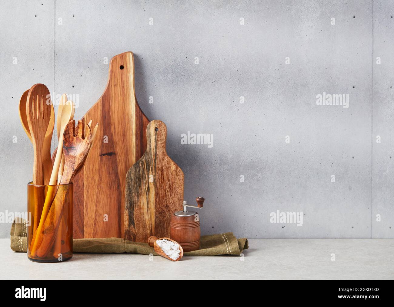 Kitchen utensils on concrete countertop Stock Photo - Alamy