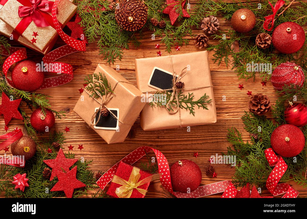 Christmas decoration and presents on wooden table Stock Photo - Alamy