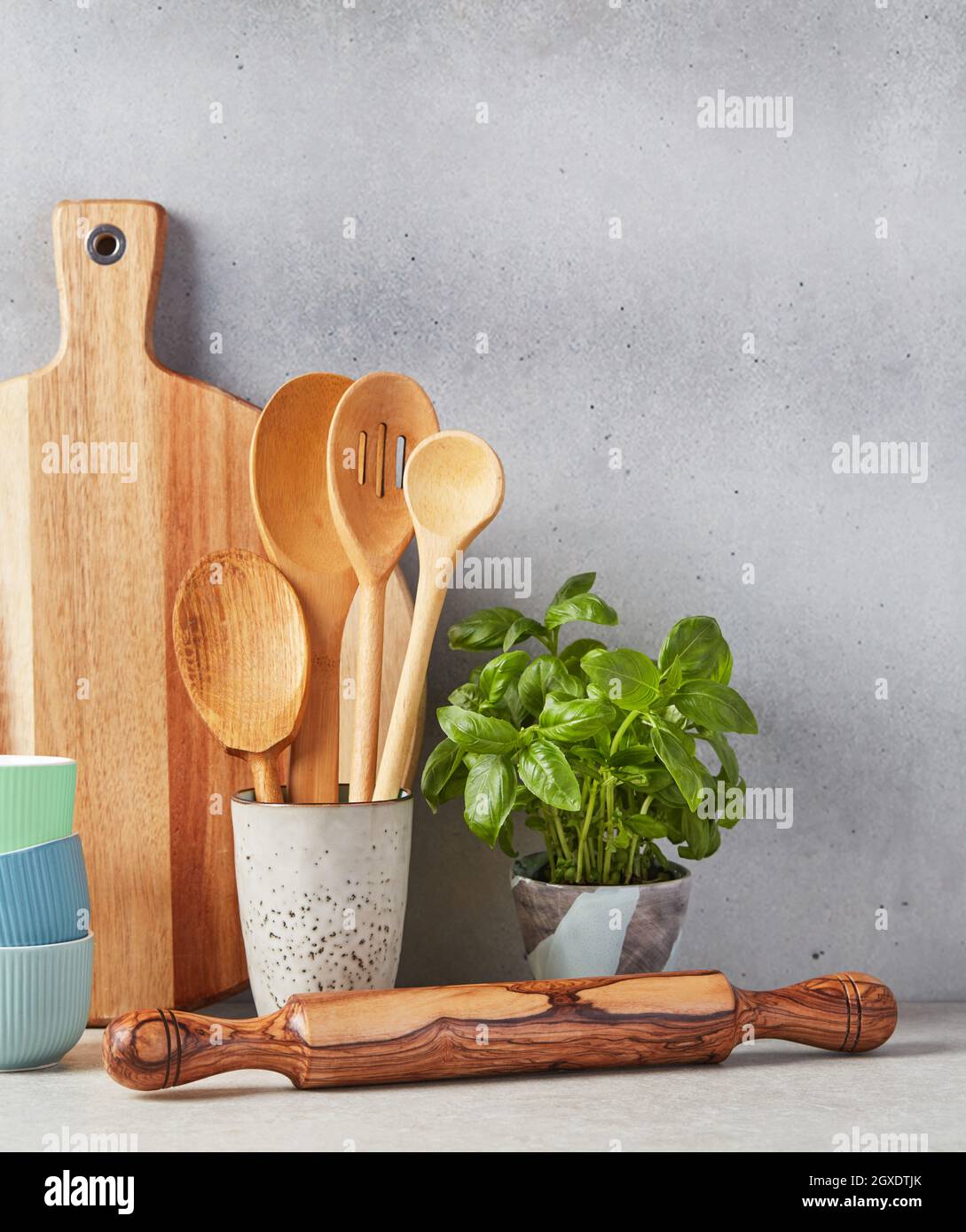 Kitchen utensils on concrete countertop Stock Photo - Alamy