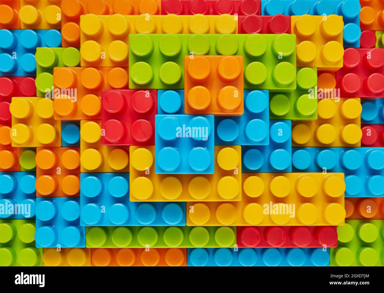 Plastic toy blocks background Stock Photo - Alamy