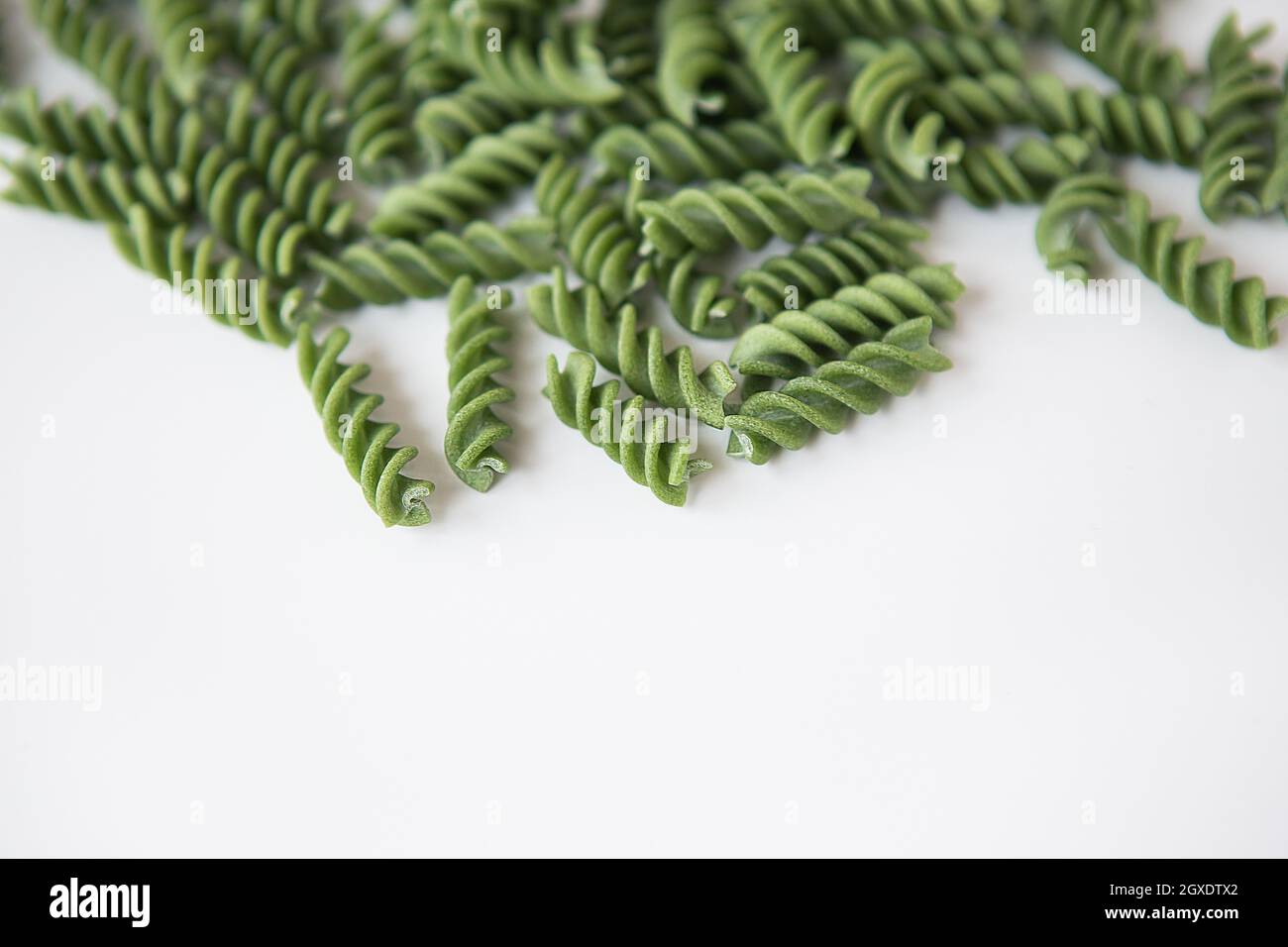 Raw green fusilli pasta, natural based on spinach and spirulina ...