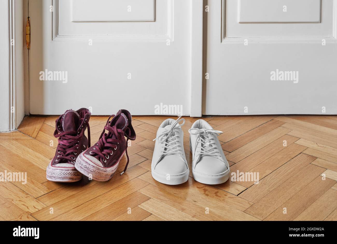 Old and new shoes on floor Stock Photo - Alamy