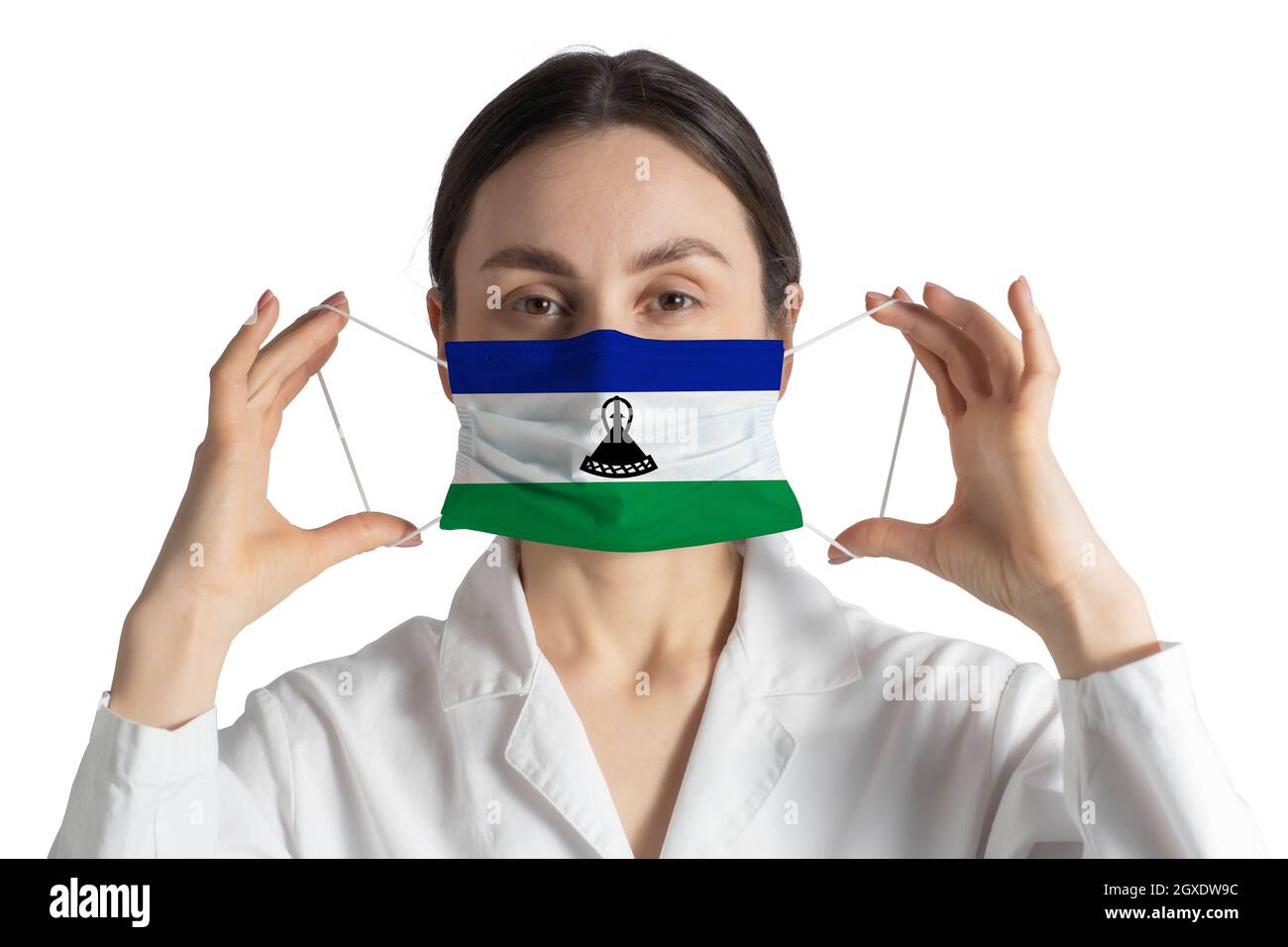 Respirator with flag of Lesotho Doctor puts on medical face mask ...