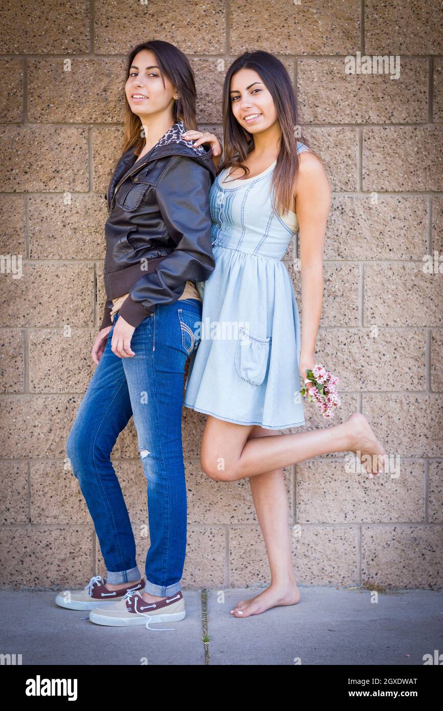 Two Beautiful Mixed Race Twin Sisters Portrait Outdoors Stock Photo - Alamy