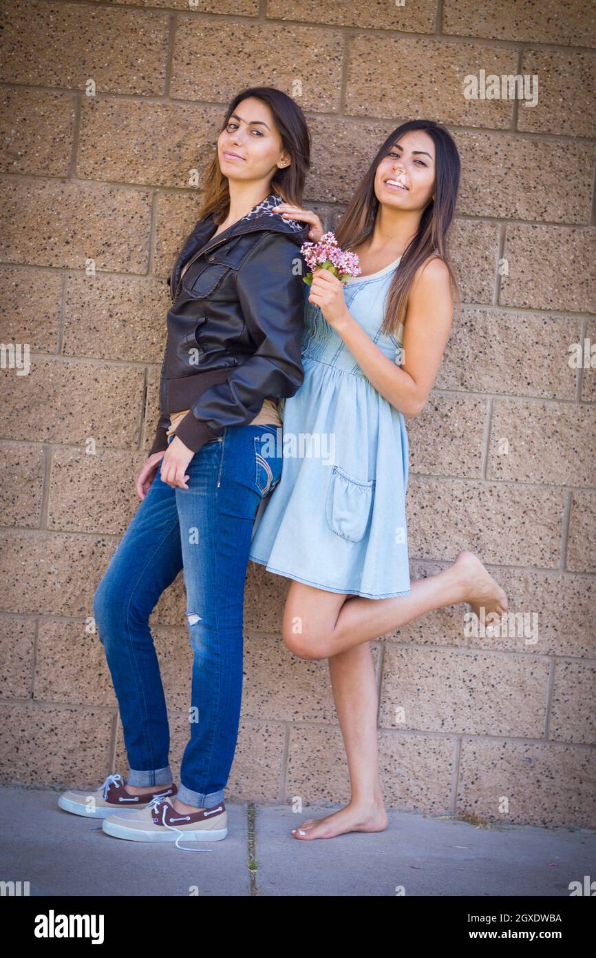 Two Beautiful Mixed Race Twin Sisters Portrait Outdoors Stock Photo - Alamy