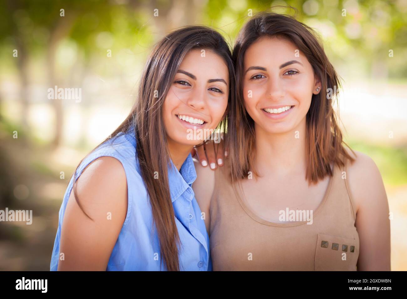 Two Beautiful Mixed Race Twin Sisters Portrait Outdoors Stock Photo - Alamy