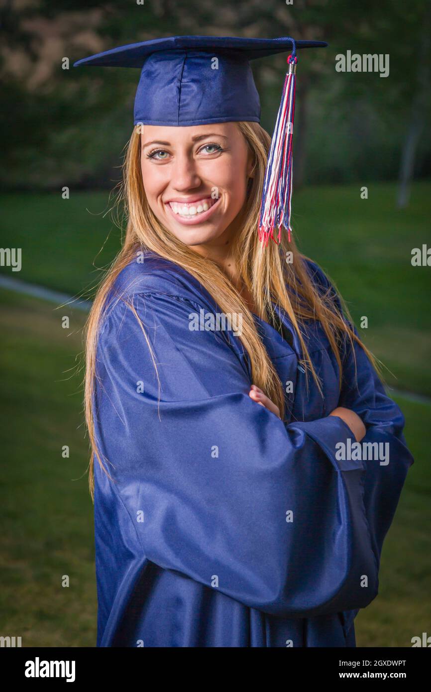 Woman wearing graduation cap gown hi-res stock photography and images ...