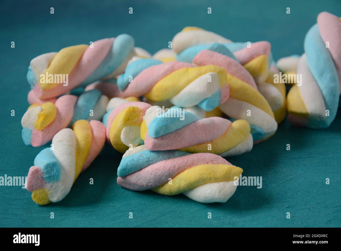 Marshmallow twists. Colored sweet chewy candies Stock Photo - Alamy