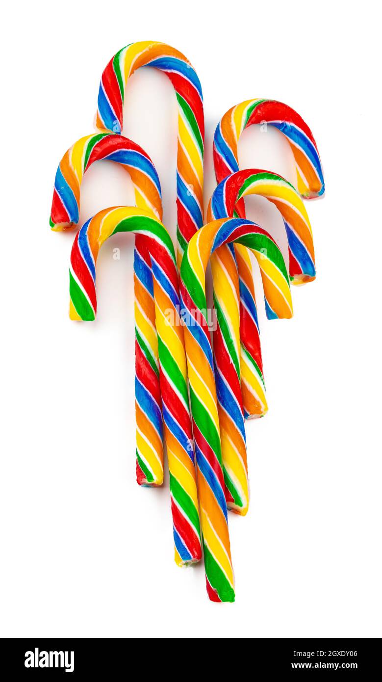 Rainbow colored candy cane isolated on white background Stock Photo - Alamy