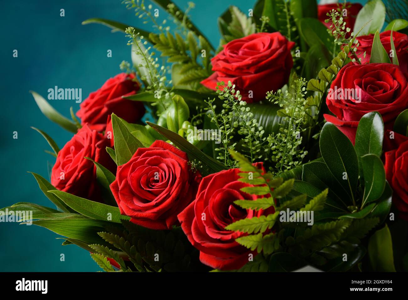 Red roses bouquet for valentine day. Love theme. Close up Stock Photo ...